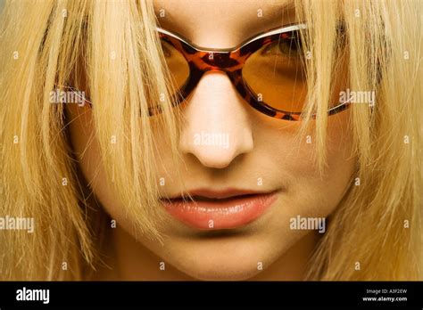 Closeup of woman wearing sunglasses Stock Photo - Alamy