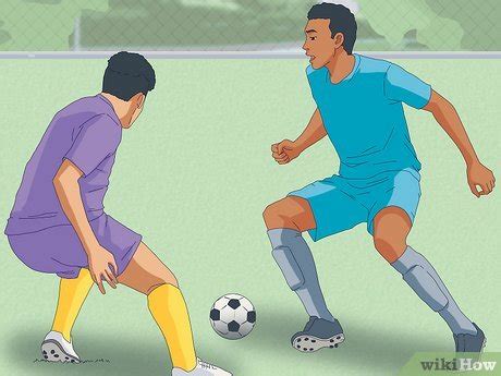 サッカーをする