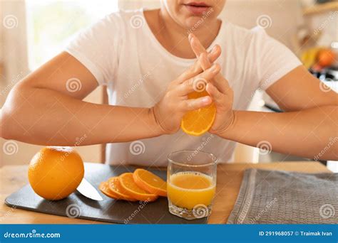 A Woman S Hands Squeeze an Orange for Juice Stock Image - Image of ...