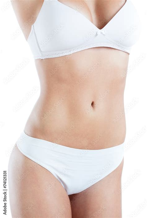 Slim female abdomen Stock Photo | Adobe Stock