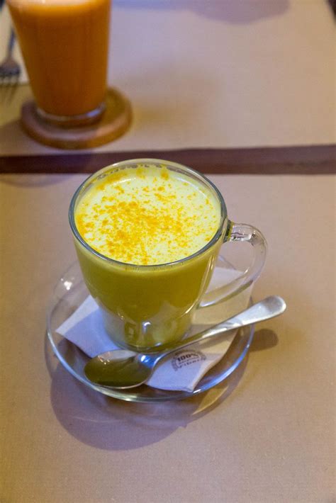 Almond milk by Belgium manufacturer Alpro, unsweetened, next to a glass ...