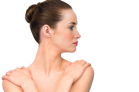 Premium Photo | Natural beauty posing with hands on shoulders