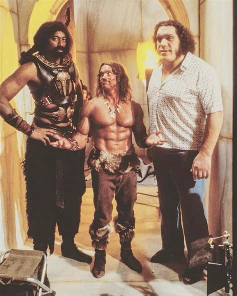 Arnold Schwarzenegger standing in between Wilt Chamberlain and Andre ...