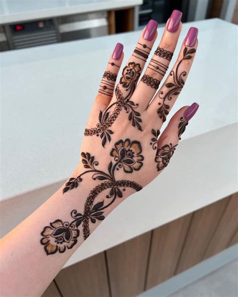 35 Henna Designs for a Beautiful Statement : Delicate Blooms Henna 1 ...