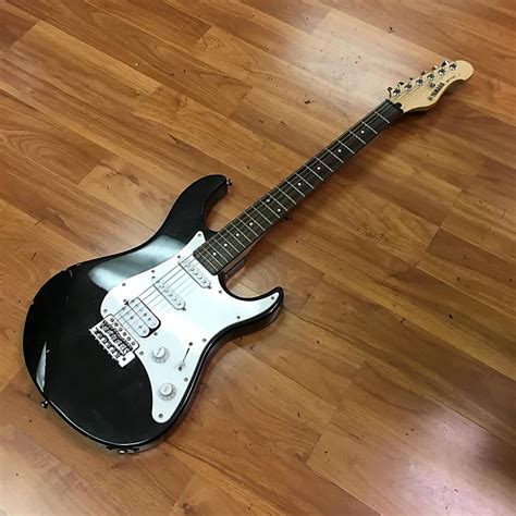 Unleash Your Inner Rockstar: A Guide To The Yamaha EG112C Electric ...