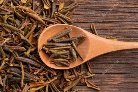 Sagan daila tea leaves close up. Sagan daila tea leaves in a spoon ...