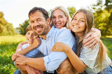 Happy Family in Harmonious Embrace Stock Image - Image of kids, brother ...