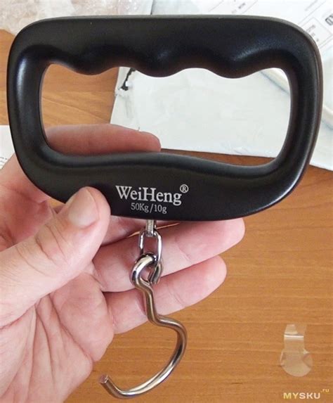 Ручные электронные весы WeiHeng. Обзор и тест цифрового безмена.