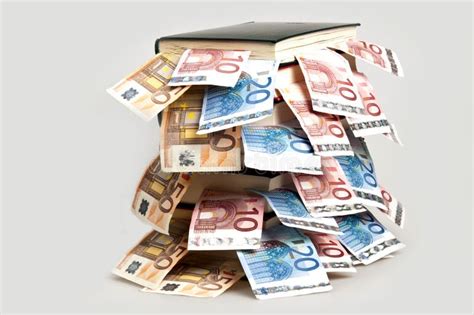 Money in books stock image. Image of financial, money - 20112155