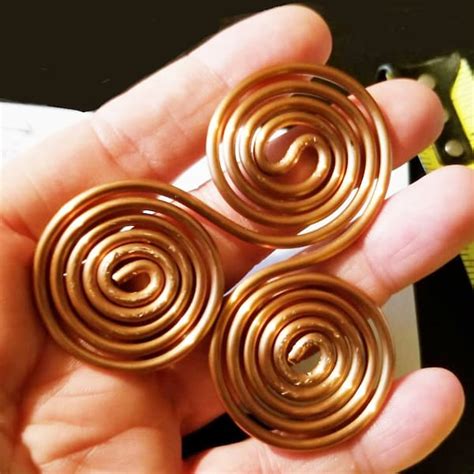 Triskelion - Etsy