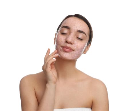 Premium Photo | Woman with pomegranate face mask on white background