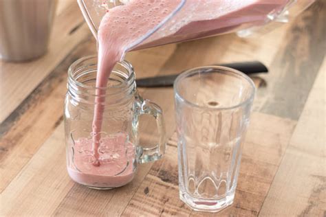 230+ Pouring Smoothie Glass Strawberry Stock Photos, Pictures & Royalty ...