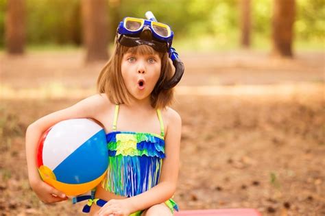 Premium Photo | A happy active young kid posing outdoor