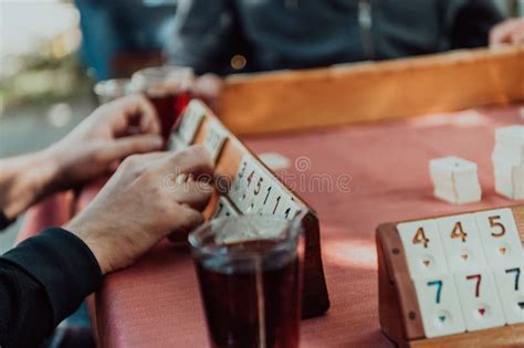 A Group of Men Drink Traditional Turkish Tea and Play a Turkish Game ...