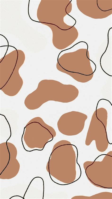 an abstract pattern with brown and white shapes