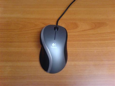Logitech MX400 Performance Laser Mouse | Smiling