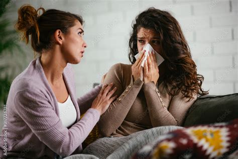 Woman broke up with boyfriend, she is crying and sister is trying to ...