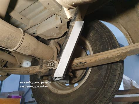 10. Защита левого заднего амортизатора — Mazda Bongo (SK), 1,8 л, 2014 ...
