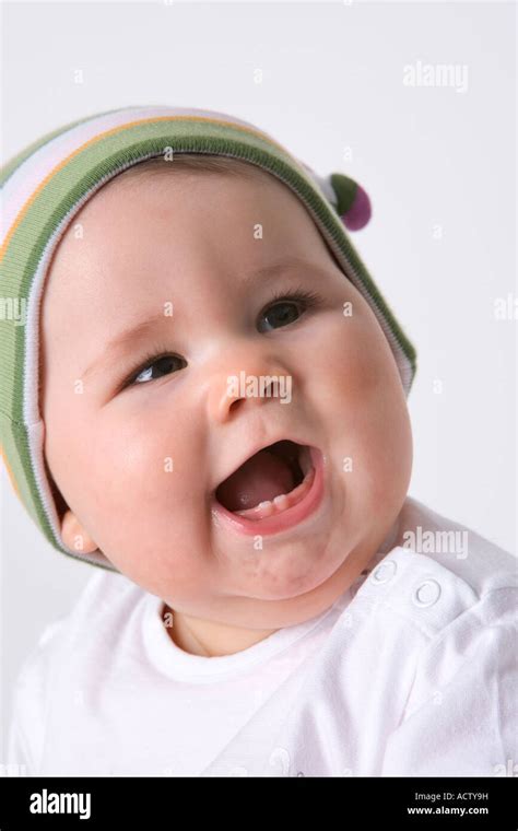 Happy baby portrait with a hat Stock Photo - Alamy