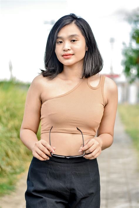Girl Wearing Brown Tank Top · Free Stock Photo