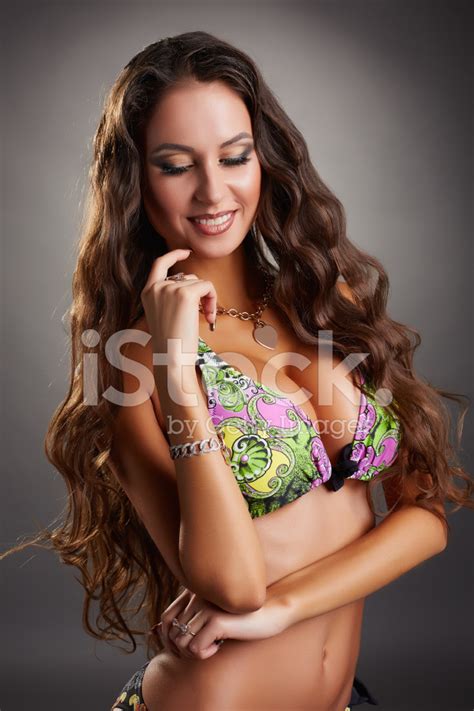 Portrait Of Coquettish Woman In Stylish Swimsuit Stock Photo | Royalty ...