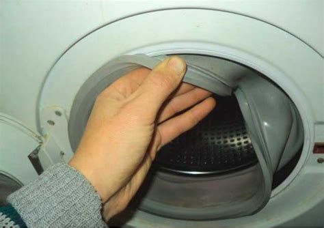 порвалась резинка в стиральной машине между барабаном и дверкой что ...