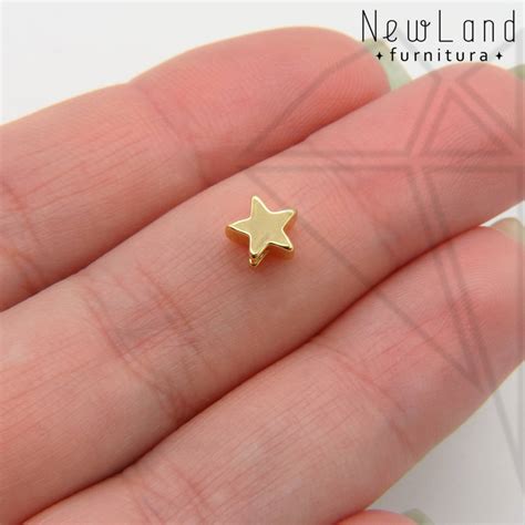 Бусины звездочки 6 мм (золото) > NewLand-furnitura