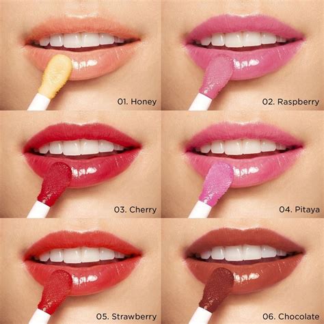 Clarins Lip Comfort Oil shades honey, raspberry, cherry, strawberry ...