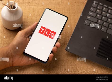 TLC logo on phone screen stock image Stock Photo - Alamy