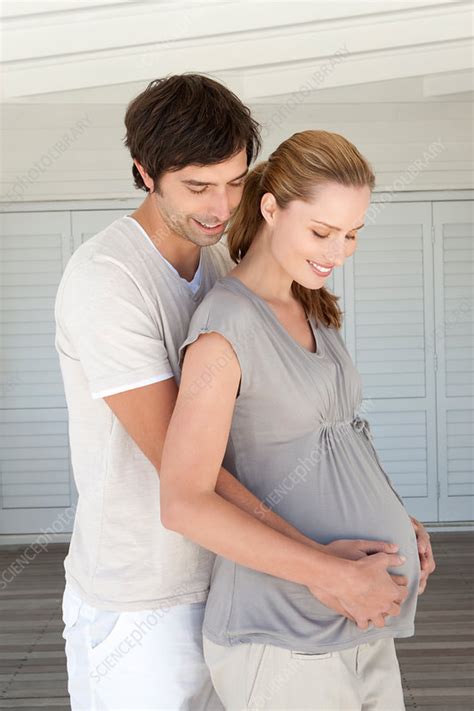 Man holding pregnant girlfriends belly - Stock Image - F005/3081 ...