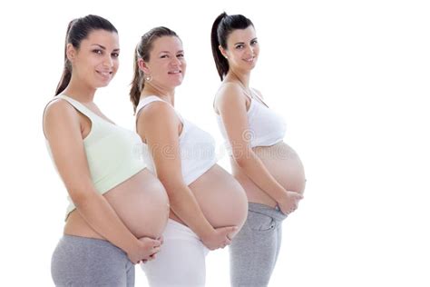 Молодые беременные женщины в третьем Trimester Стоковое Изображение ...