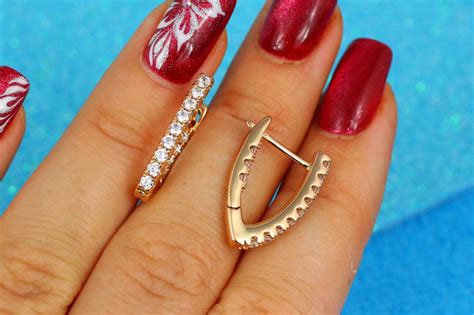 Купить Серьги Xuping Jewelry дорожки с крупными камнями спереди и сзади ...