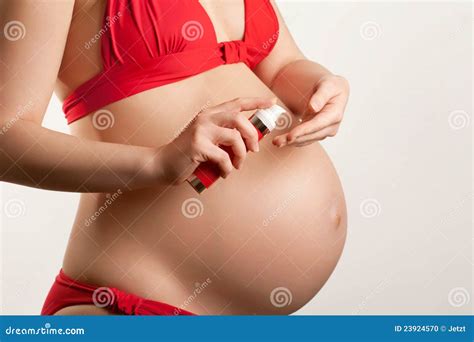 Skin Care: Young Pregnant Woman with Body Cream Stock Photo - Image of ...