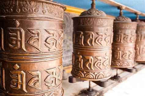 Premium Photo | Bhuddist prayer drums with tibetan mantras
