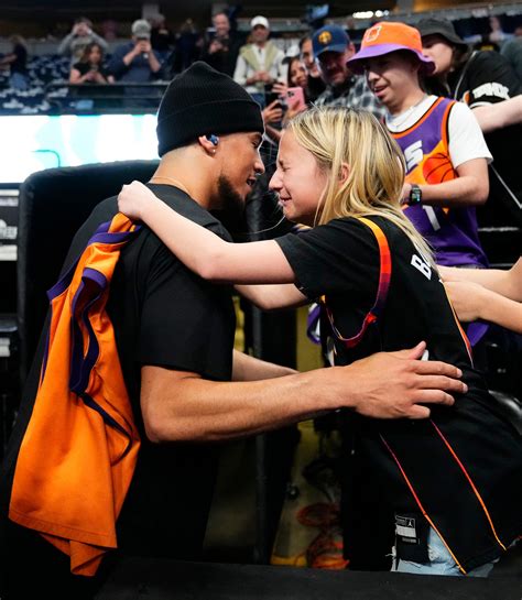 Devin Booker's pre-game hug brings young fan to tears before Suns-Nuggets game