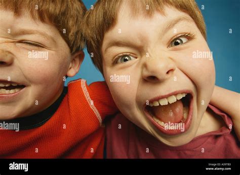 Two young friends having a blast Stock Photo - Alamy