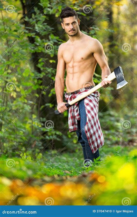 Young muscular lumberjack stock photo. Image of lumberjack - 37047410