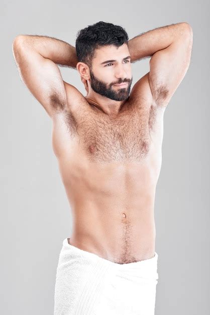 Premium Photo | Skincare towel and man with cosmetics thinking and natural beauty on grey studio ...