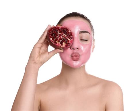Premium Photo | Woman with pomegranate face mask and fresh fruit on ...