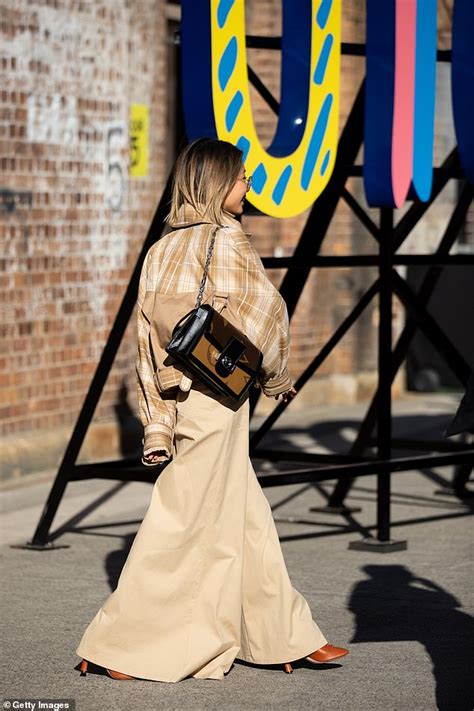 Fashion blogger Yan Yan Chan catches the eye as she steps out at ...