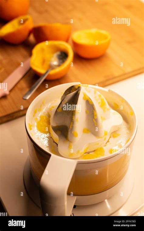 Squeezing orange juice pouring glass hi-res stock photography and images - Alamy