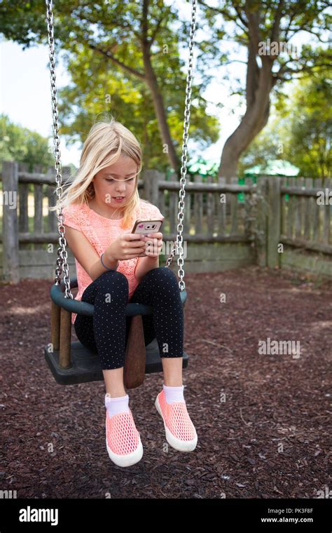 Children using iPad and iPhone Stock Photo - Alamy