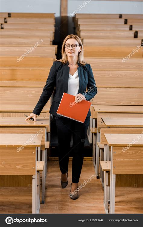 Female University Professor Formal Wear Holding Journal Pen Classroom ...