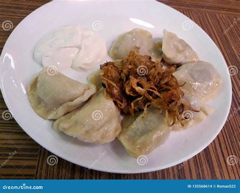 Ukrainian Dish Vareniki, Ukrainian Dumplings, Pierogi With Sauce ...