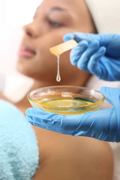 Hot wax hair removal - Stock Image - Everypixel