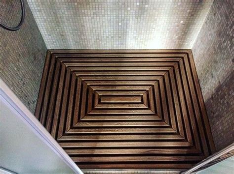 an overhead view of a wooden floor in a bathroom