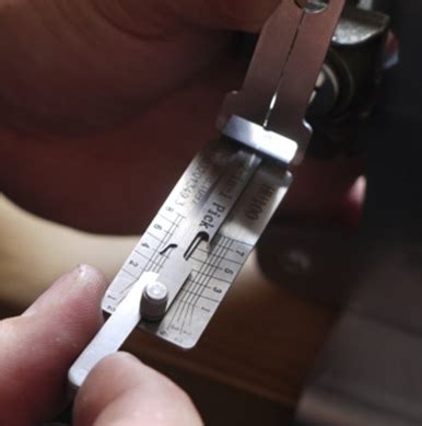 Picking and Decoding the HU100 Lock with Genuine Lishi